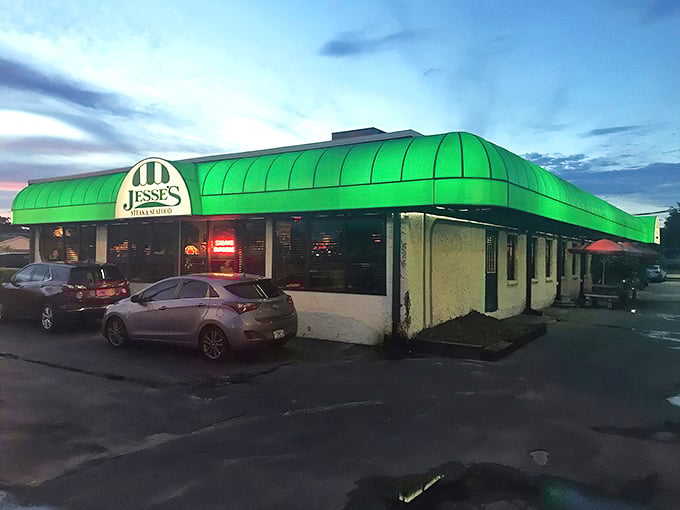 The iconic green awning of Jesse's Steak & Seafood stands as a beacon for hungry Floridians, promising old-school delights within those unassuming doors.