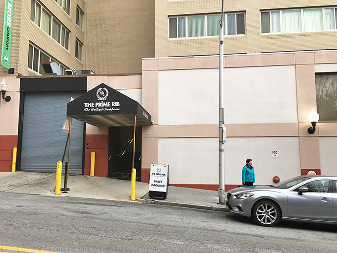 The understated elegance of The Prime Rib's entrance promises what lies beyond&mdash;a Baltimore dining institution where time stands deliciously still.