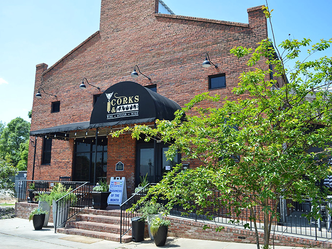The warm glow of this historic brick building beckons like a lighthouse for hungry souls. Enterprise's best-kept secret stands proudly against the Alabama sky.