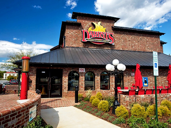 The brick exterior of Darryl's stands like a culinary fortress, complete with its distinctive water tower&mdash;architectural proof that good taste extends beyond the menu. 