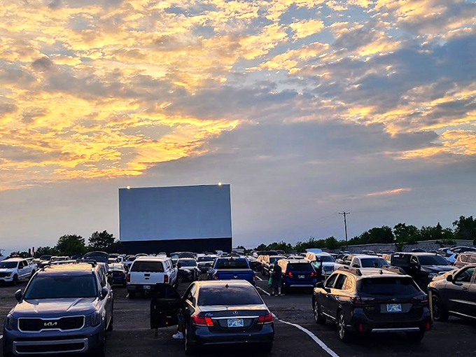 Sunset magic at the Winchester Drive-In, where vintage trucks and modern sedans share the same timeless experience under Oklahoma's painted sky.