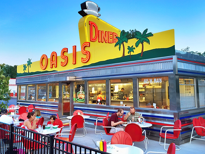 The sunshine-yellow facade of Oasis Diner gleams like a beacon of hope for hungry travelers. This isn't just a restaurant&mdash;it's a time machine with french fries.