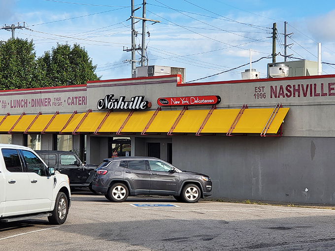 That iconic yellow awning isn't just a sunshade&mdash;it's a beacon of hope for sandwich lovers seeking refuge from Nashville's hot chicken monopoly.