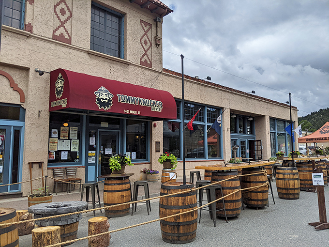 The iconic red awning of Tommyknocker beckons like a mountain oasis. Wooden barrel tables outside create the perfect perch for people-watching and beer-sipping.