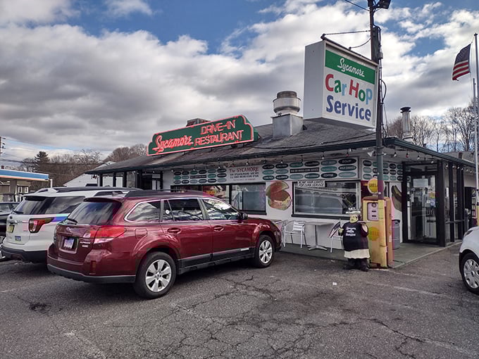 That neon glow isn't just illuminating the night—it's beckoning you to a Connecticut treasure where time stands deliciously still.