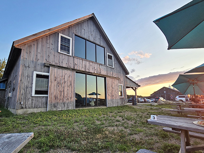 The weathered barn exterior isn't just Instagram-worthy&mdash;it's a promise of authenticity. New Hampshire's rolling hills provide the perfect backdrop for this farmstead treasure.