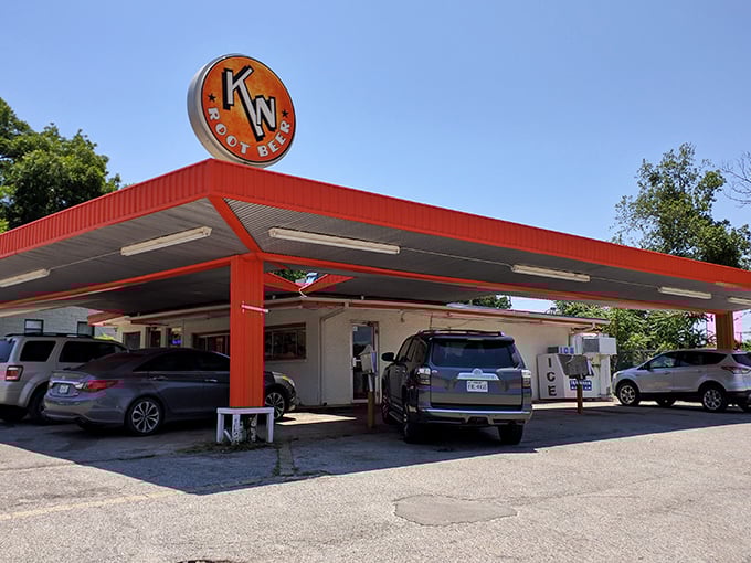 The unassuming exterior of K N Root Beer Drive In proves once again that Texas's greatest culinary treasures often hide in plain sight.