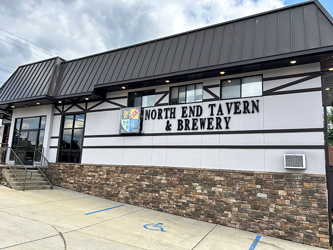The Tudor-style exterior of North End Tavern & Brewery stands as a welcoming beacon for hungry travelers and thirsty locals alike.