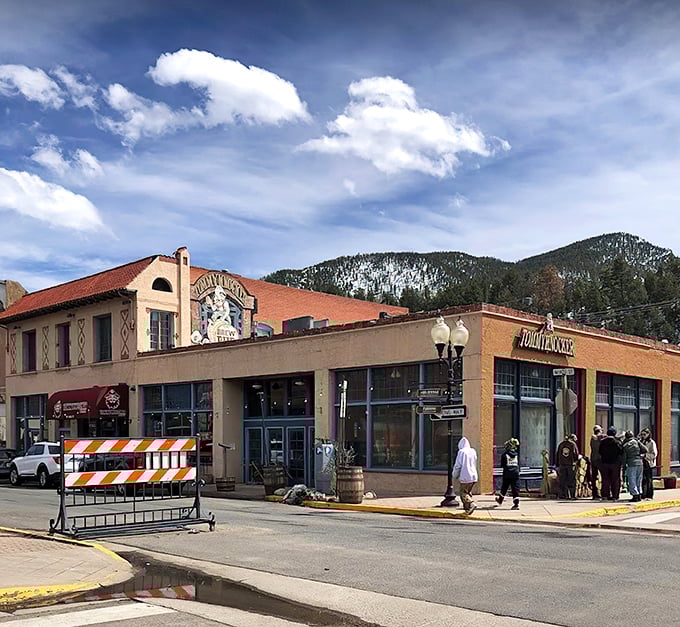 The iconic red awning of Tommyknocker beckons like a mountain oasis. Wooden barrel tables outside create the perfect perch for people-watching and beer-sipping.