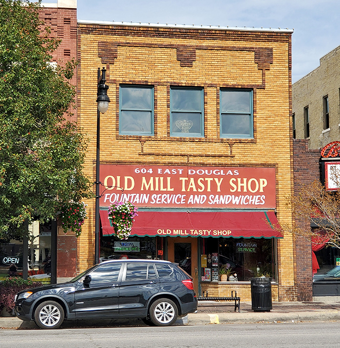 The yellow-brick storefront with its vintage red awning isn't just preserving history&mdash;it's practically a time portal to 1932 Wichita with better sandwiches.