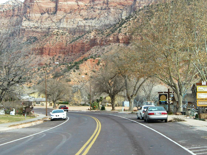 Springdale's main drag welcomes you with that perfect small-town charm, where towering red cliffs replace skyscrapers and nature writes the skyline.