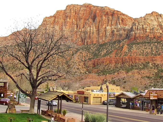 Springdale's main drag welcomes you with that perfect small-town charm, where towering red cliffs replace skyscrapers and nature writes the skyline.