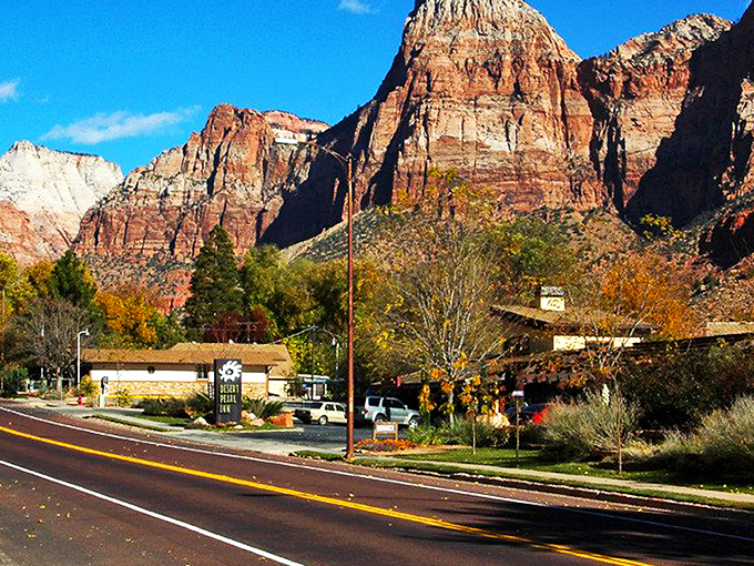 Springdale's main drag welcomes you with that perfect small-town charm, where towering red cliffs replace skyscrapers and nature writes the skyline.