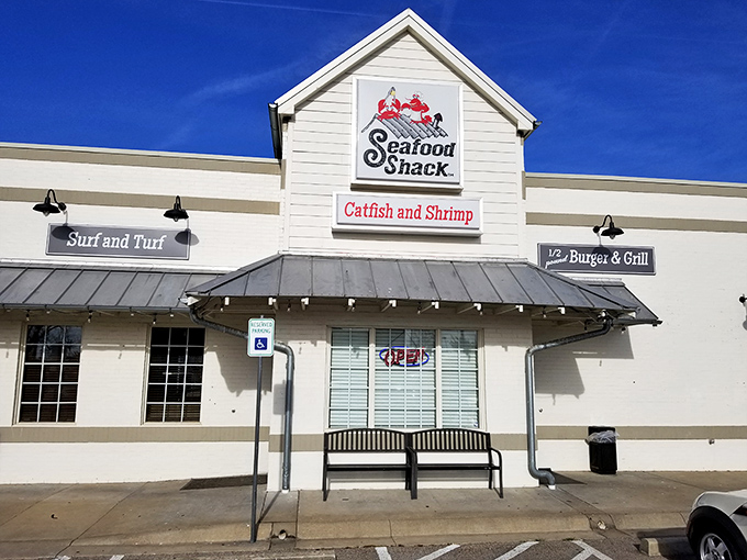 The Seafood Shack's inviting exterior promises maritime delights in landlocked Arkansas. String lights and outdoor seating beckon hungry travelers like a lighthouse for seafood lovers.