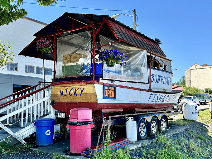 The iconic Bowpicker boat sits proudly on land, a retired fishing vessel now serving up treasures of a different kind. The nautical-to-culinary career change we all secretly admire. 