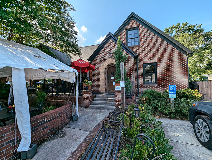 The Manchester Arms brings quintessential British charm to College Park with its stately brick exterior and inviting red patio umbrella. England has landed in Georgia!