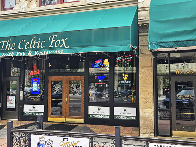 The Celtic Fox's emerald-green awnings stand out like a beacon of Irish hospitality on Topeka's historic downtown strip. Architecture that whispers "come in for a pint."