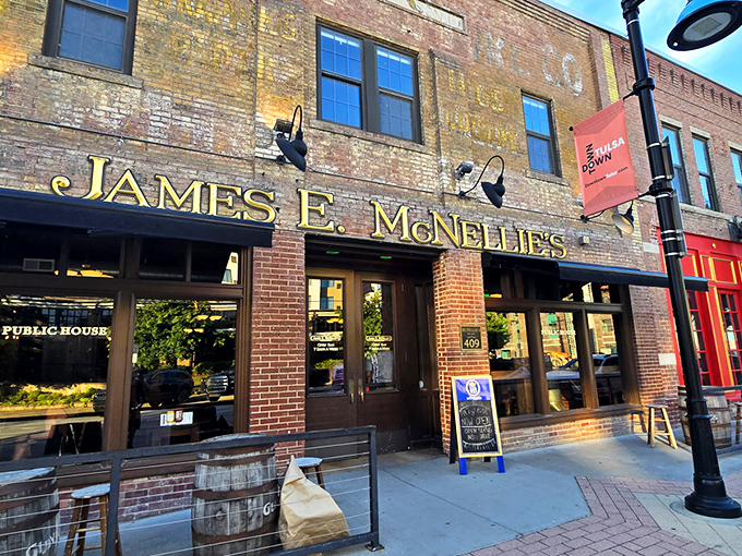 The historic brick facade of James E. McNellie's stands proudly in downtown Tulsa, a beacon for those seeking authentic pub comfort in Oklahoma.