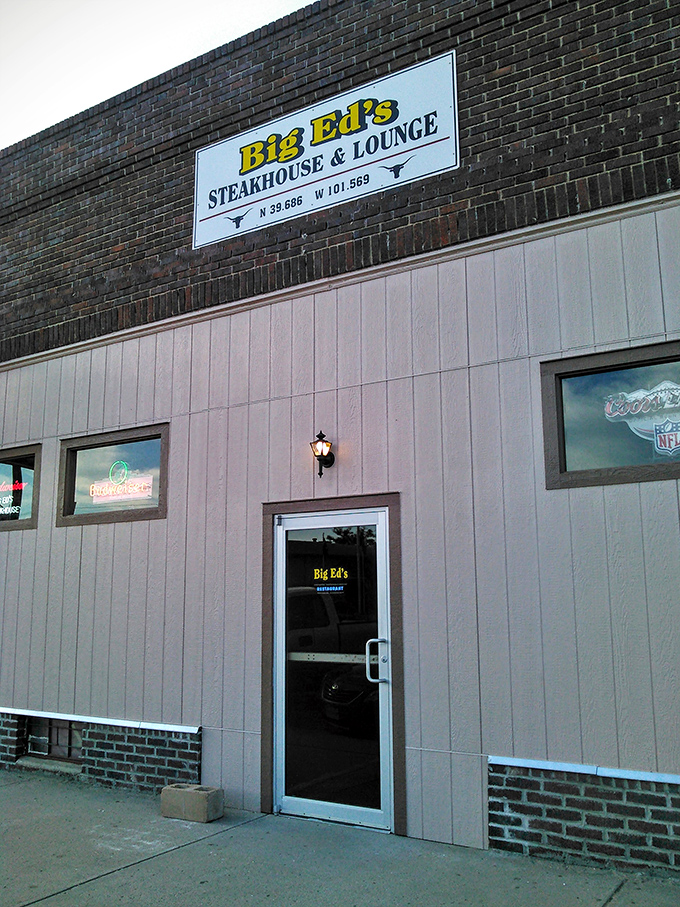 The unassuming brick exterior of Big Ed's hides culinary treasures within, like finding a diamond mine disguised as a storage shed. 