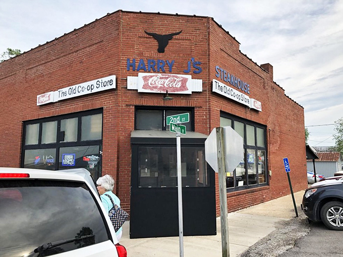 The humble brick exterior of Harry J's Steakhouse belies the culinary treasures within, a classic case of "don't judge a steak by its storefront."