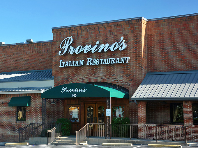 The iconic brick fa&ccedil;ade and emerald awning of Provino's stands as a beacon of hope for the pasta-deprived masses of Kennesaw.