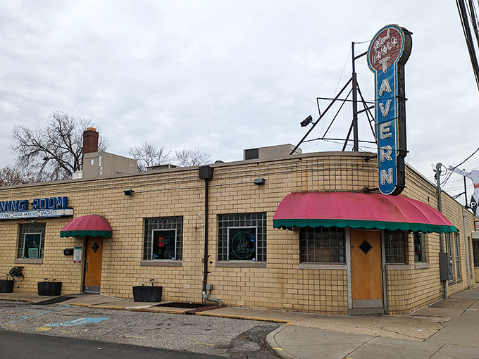 The vintage "TAVERN" sign beckons pasta pilgrims to this unassuming yellow-brick building that's been feeding Indianapolis longer than most of us have been hungry.