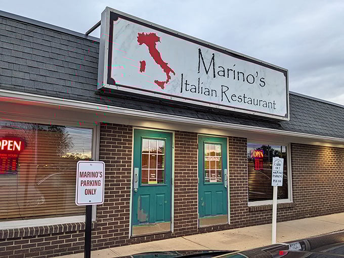The iconic Marino's sign with Italy's boot in red says it all: authentic Italian awaits behind that turquoise door in Johnston.