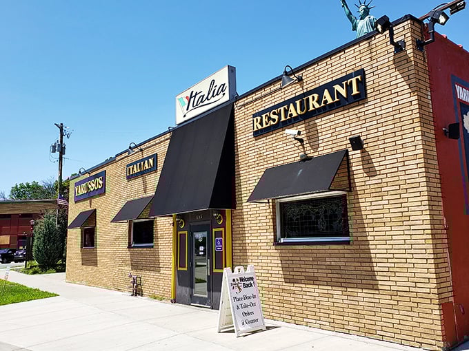 The unassuming exterior of Yarusso Bros stands like a culinary sentinel in St. Paul's East Side, promising Italian treasures within those brick walls.