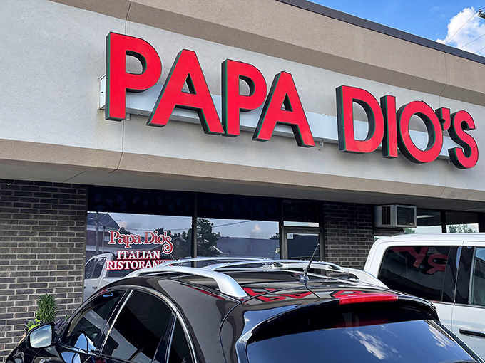The glowing red sign beckons like a lighthouse for the pasta-starved. No fancy frills, just the promise of authentic Italian goodness waiting inside.