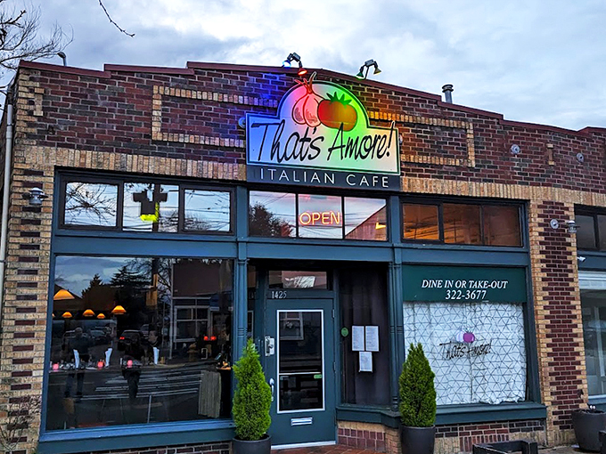 That neon tomato sign isn't just winking at you&mdash;it's inviting you into a brick-fronted paradise where pasta dreams come true.