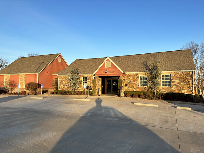 The stone facade and rustic red exterior of StoneHouse welcomes you like an old friend who happens to have impeccable taste in architecture.