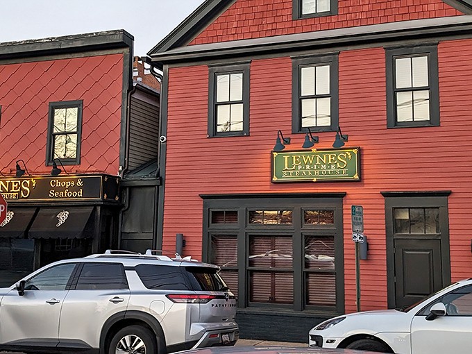 The unassuming corner building with its distinctive red exterior houses culinary treasures that would make even the most jaded carnivore weep with joy.