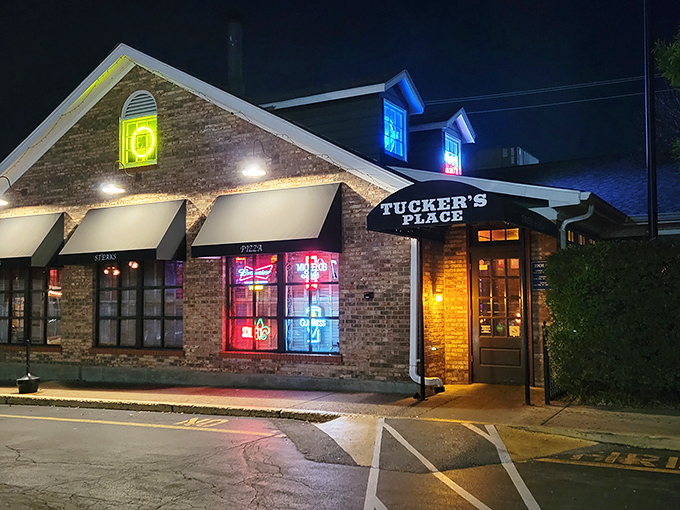 The iconic brick exterior of Tucker's Place glows with welcome in the evening light, a beacon for hungry carnivores throughout Manchester.