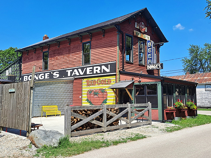 The unassuming red exterior of Bonge's Tavern stands like a culinary lighthouse in rural Indiana, beckoning hungry travelers since 1934. 