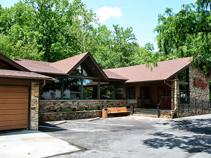 The rustic stone and timber exterior of The Peddler Steakhouse blends perfectly with its Smoky Mountain surroundings, like a carnivore's cabin in the woods.