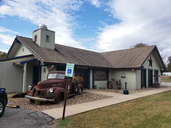 The vintage pickup truck outside Down Home Family Restaurant isn't just decoration—it's a time machine to when food was honest and portions were heroic.