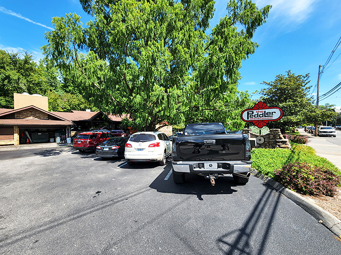 The rustic stone and timber exterior of The Peddler Steakhouse blends perfectly with its Smoky Mountain surroundings, like a carnivore's cabin in the woods.