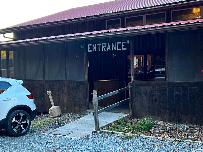 The unassuming exterior of Firecreek BBQ & Steaks might fool you, but that red-roofed wooden building houses flavor explosions that'll make your taste buds dance.