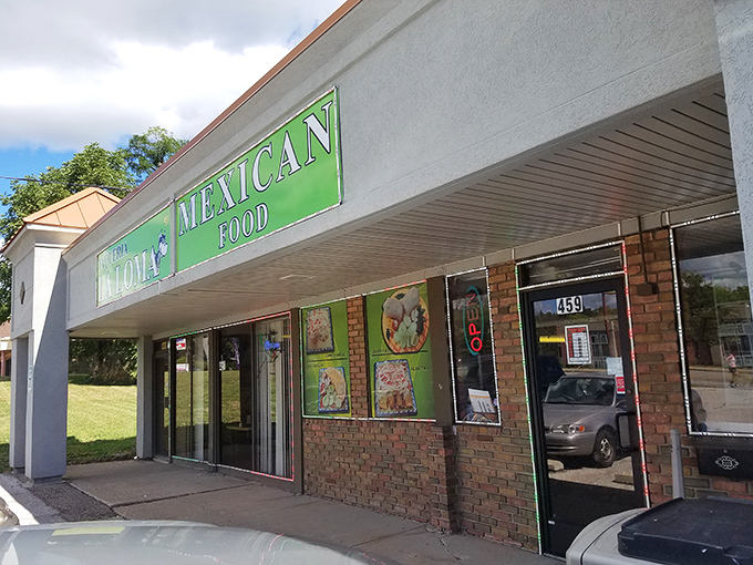 The unassuming exterior of Taqueria La Loma might not scream "culinary destination," but that green sign is basically a beacon for tamale lovers across Ohio.