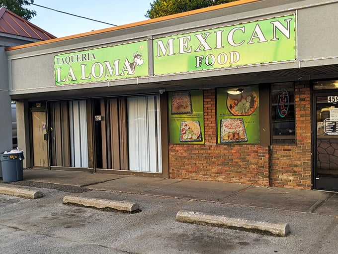 The unassuming exterior of Taqueria La Loma might not scream "culinary destination," but that green sign is basically a beacon for tamale lovers across Ohio.