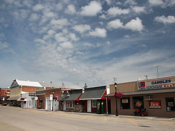 Main Street Kalona greets visitors with classic Americana charm. Those puffy clouds seem to move at the same unhurried pace as the town below.