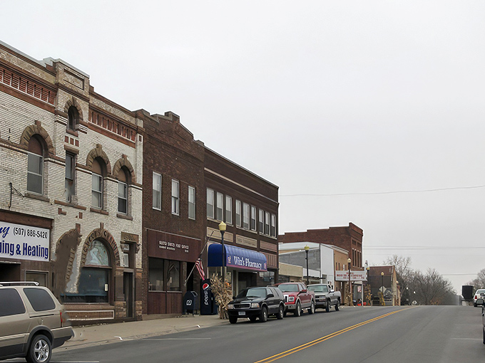 Main Street Harmony whispers stories of simpler times, where brick buildings stand proud against Minnesota's blue skies. Small-town America at its most authentic.