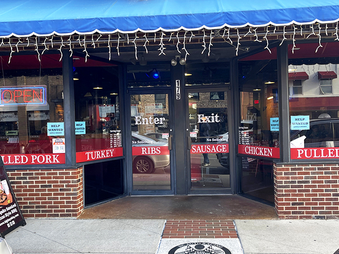 The neon "OPEN" sign at Big Tiny's isn't just an invitation&mdash;it's a siren call to barbecue pilgrims. Those colorful string lights aren't decorations; they're beacons of smoked meat salvation.