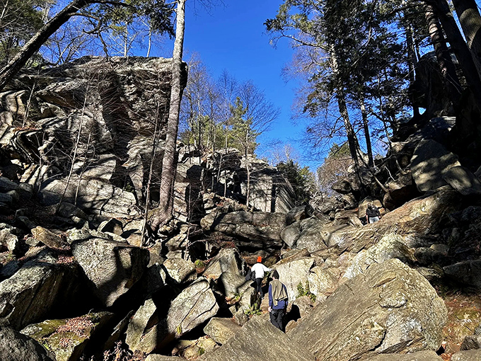Nature's own grand canyon in miniature, where towering granite walls create a dramatic corridor that makes you feel wonderfully small in the best possible way.