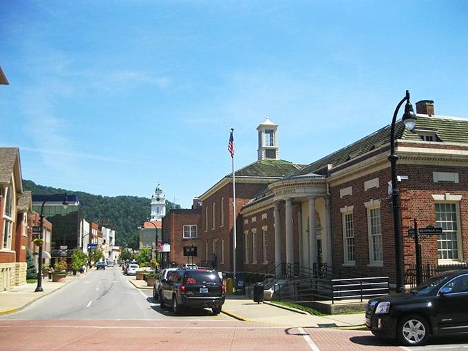 Pikeville's historic downtown showcases classic brick architecture against a backdrop of blue Kentucky skies, where small-town charm meets thoughtful preservation.