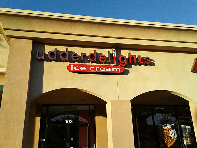 Udder Delights nestles between neighboring shops in this Gilbert strip mall—proof that extraordinary ice cream experiences often hide in ordinary places.