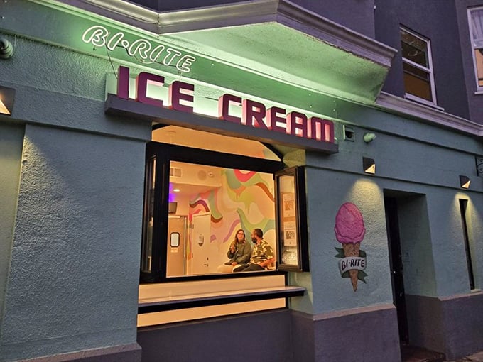 The mint-green facade with its vintage neon sign beckons like a siren song. San Francisco's ice cream pilgrimage site glows invitingly against the evening sky.