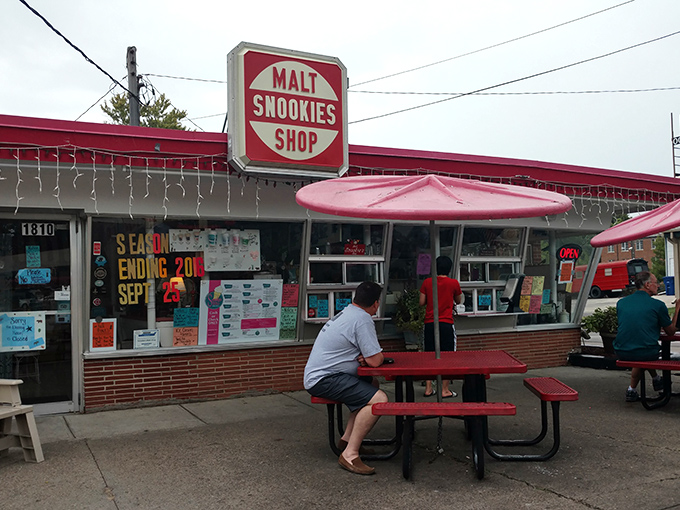 The iconic red and white Snookies sign stands like a beacon of frozen delight, promising sweet relief from Iowa summer heat. 