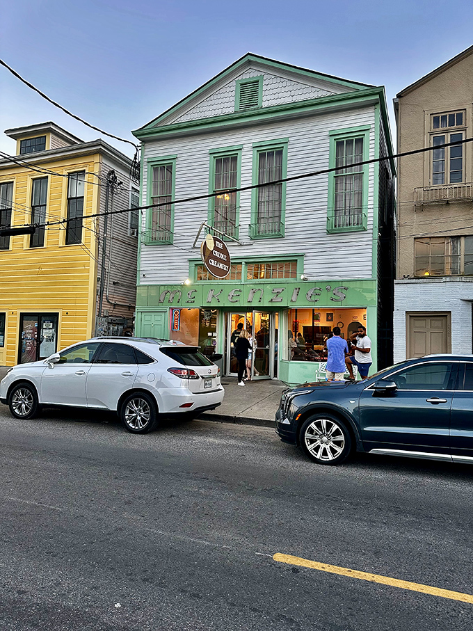 
The mint-green facade of Creole Creamery stands like a sweet beacon on Prytania Street, promising frozen happiness within those historic walls.