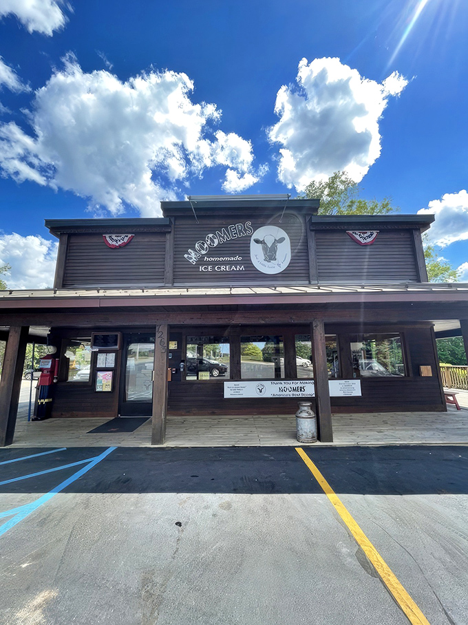 The iconic red barn of Moomers stands like a beacon of dairy delight, promising cold comfort in a world that's often too heated.